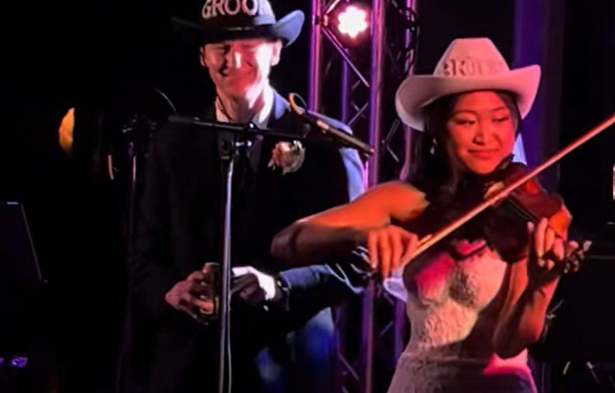 Bride Goes Viral with A Stellar Fiddle Performance of "Callin' Baton ...